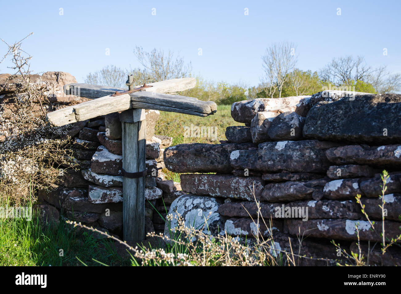 Access outdoors through an old weathered wooden turnstile Stock Photo ...