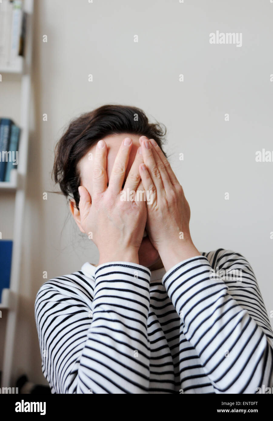 Woman coy shy expression hi-res stock photography and images - Alamy