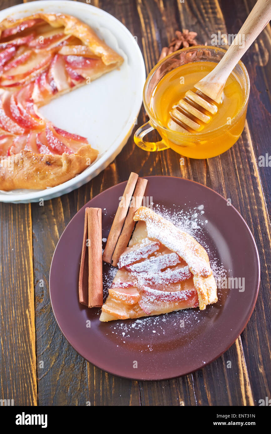 apple pie on plate and on a table Stock Photo - Alamy