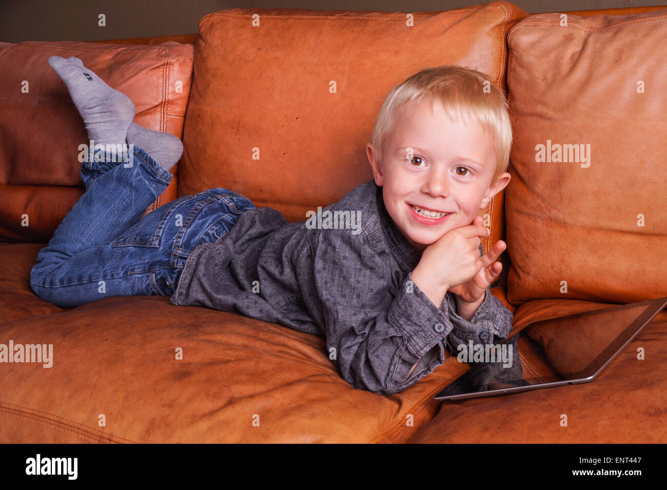 Modern child using digital tablet hi-res stock photography and images ...