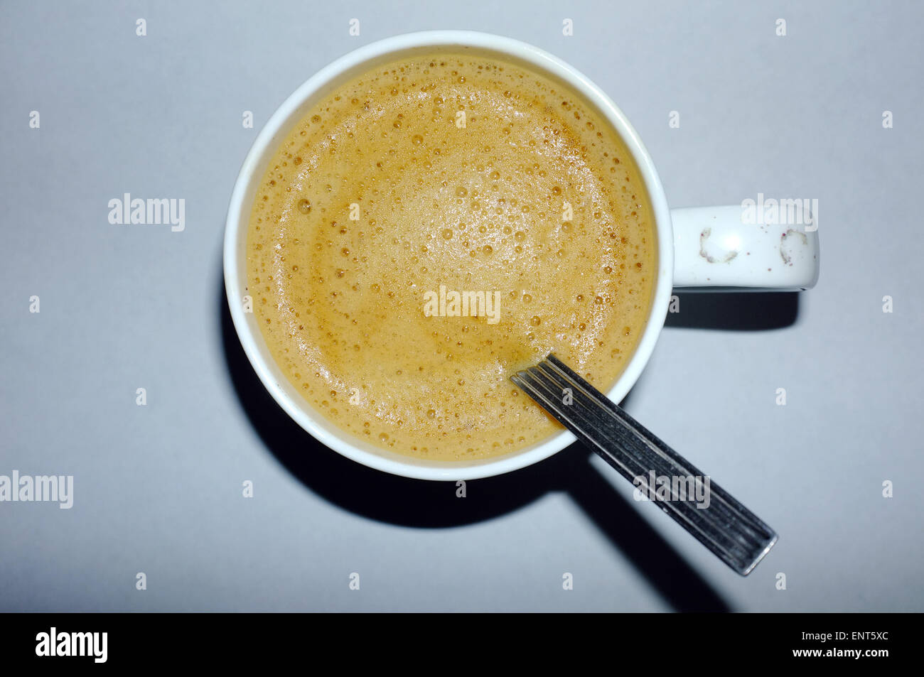 An overhead view of a freshly made cup of coffee Stock Photo - Alamy