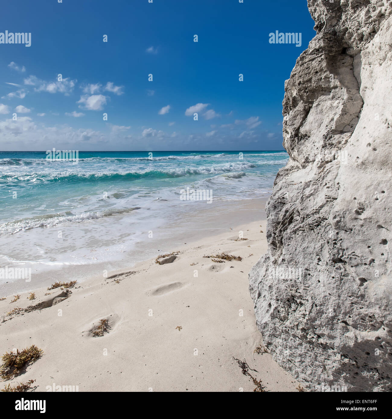 Ocean with waves and rocks on caribbean beach Stock Photo - Alamy