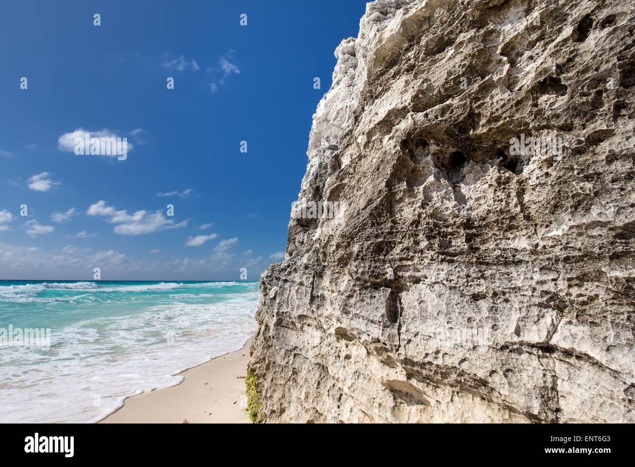 Ocean with waves and rocks on caribbean beach Stock Photo - Alamy