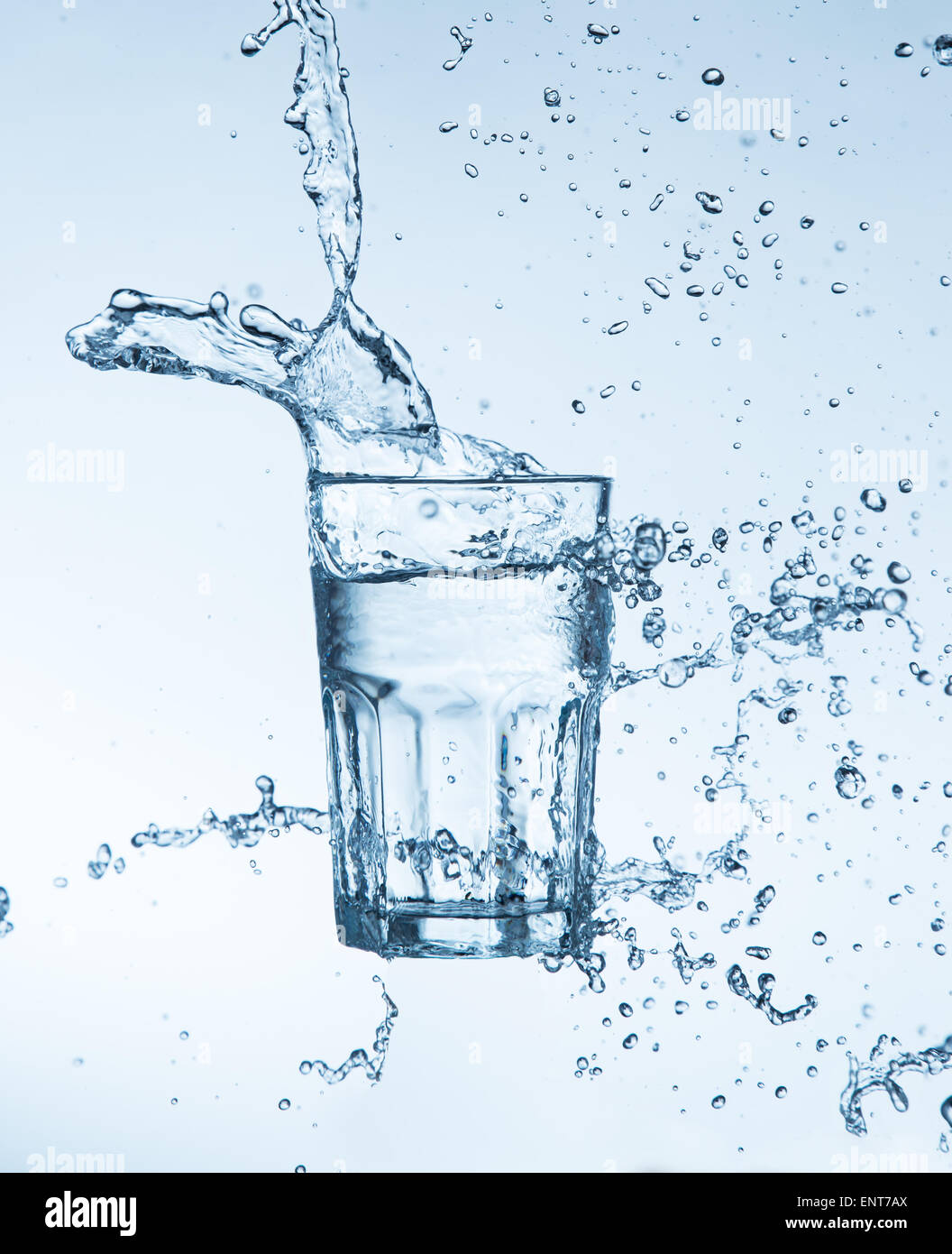 water splashing from glass isolated on white background Stock Photo - Alamy