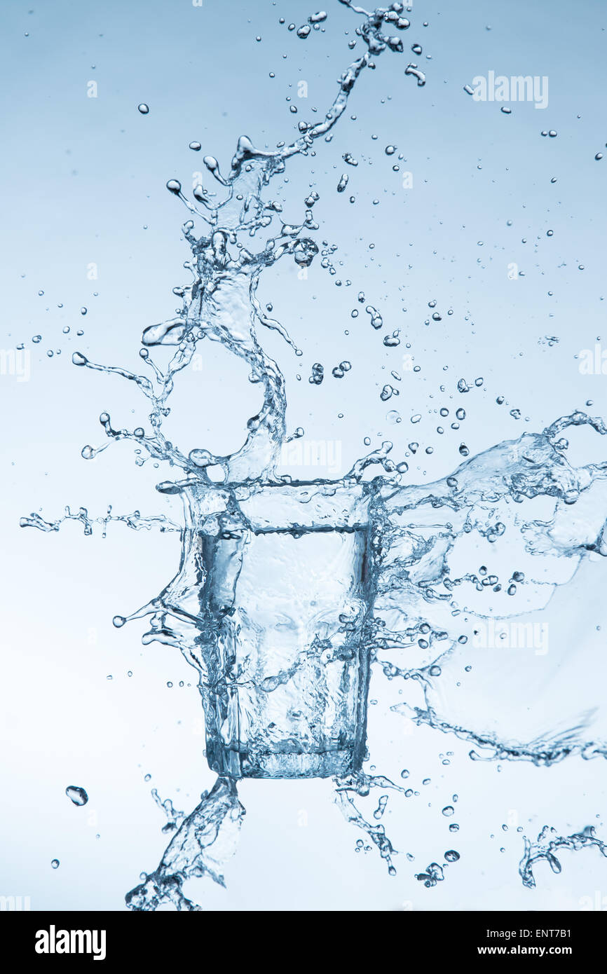 water splashing from glass isolated on white background Stock Photo - Alamy