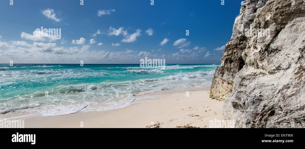 Ocean with waves and rocks on caribbean beach Stock Photo - Alamy