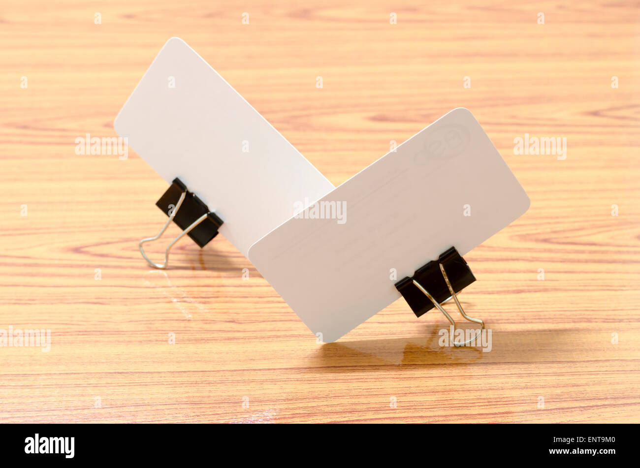 card and clip design on wood background Stock Photo - Alamy