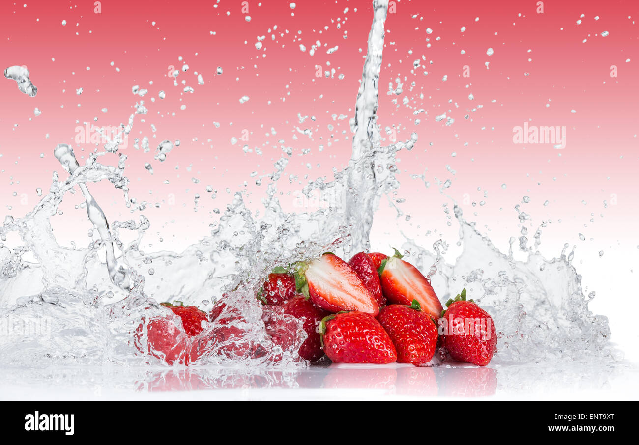 Fresh fruit with water splash Stock Photo - Alamy