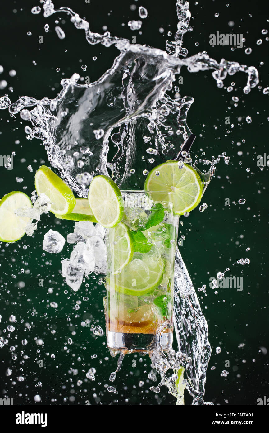 fresh mojito drink with liquid splash, freeze motion Stock Photo - Alamy