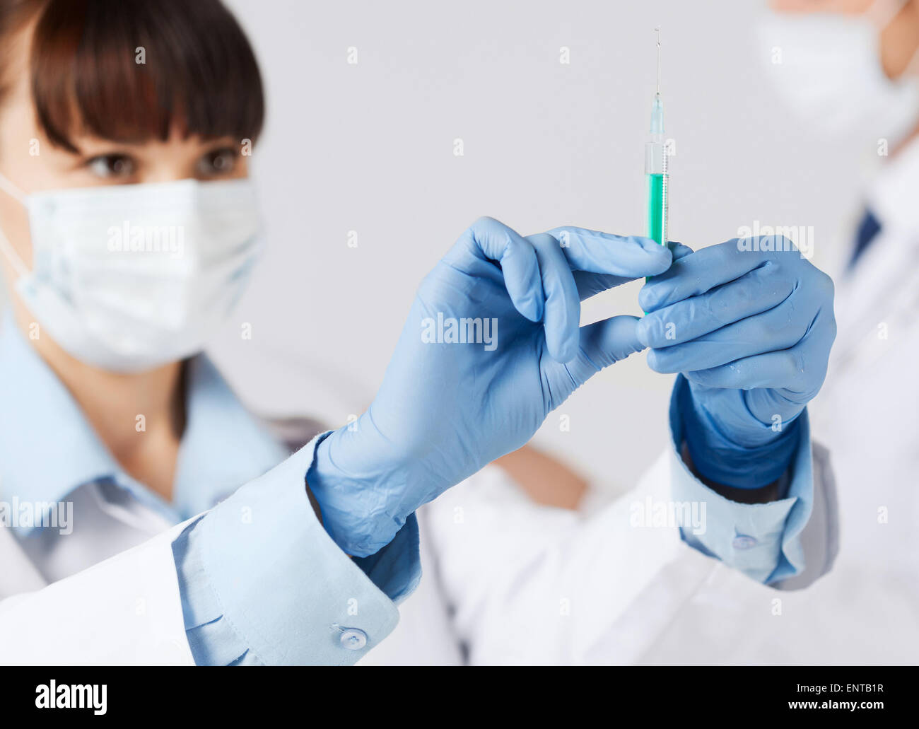 doctors with syringe Stock Photo - Alamy