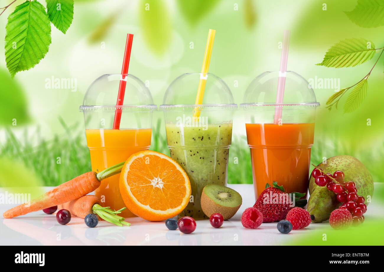 Fresh juice mix fruit, healthy drinks on wooden table Stock Photo - Alamy