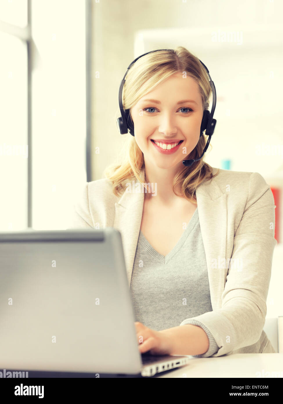 helpline operator with laptop computer Stock Photo - Alamy