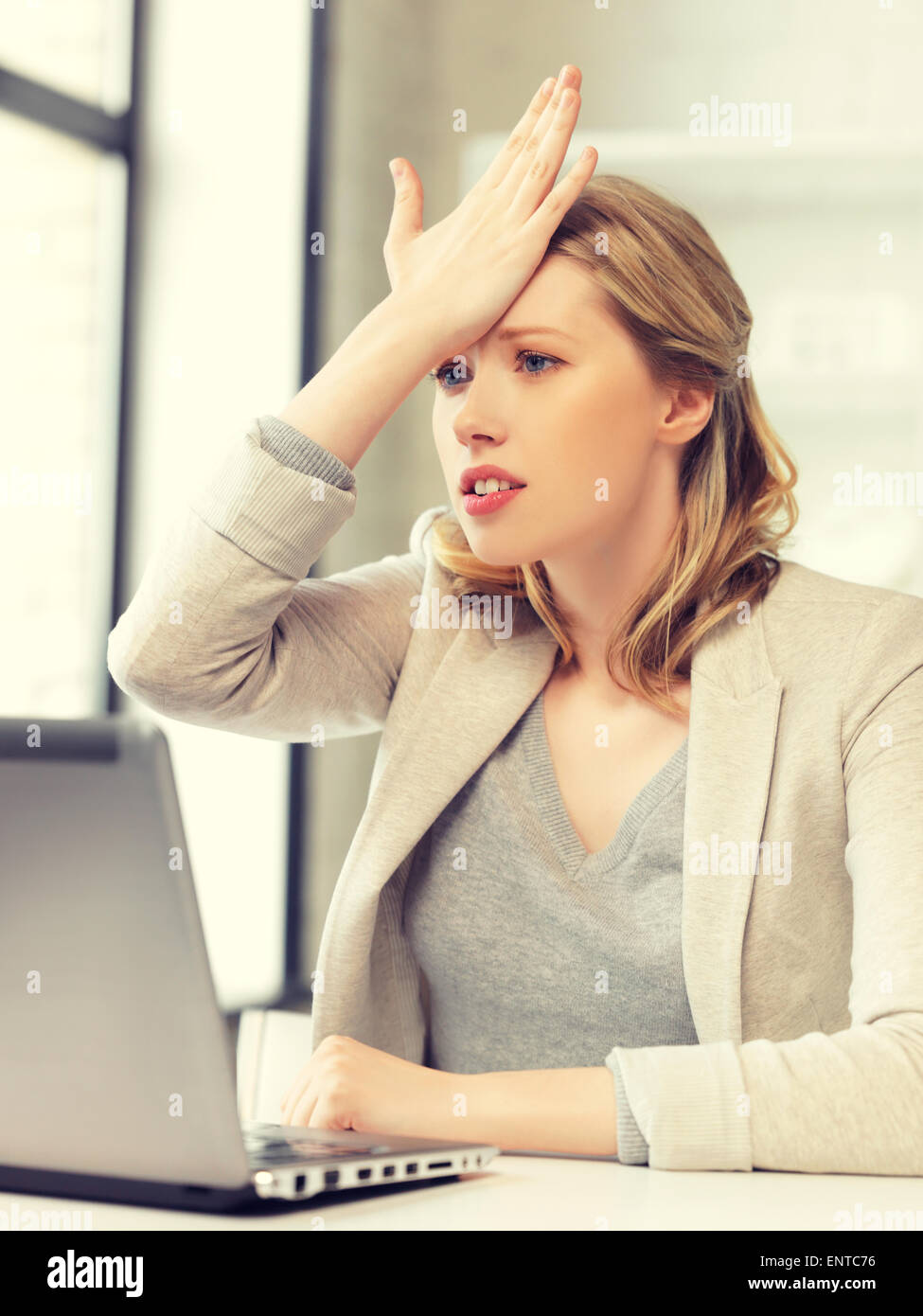 stressed woman with laptop computer Stock Photo - Alamy