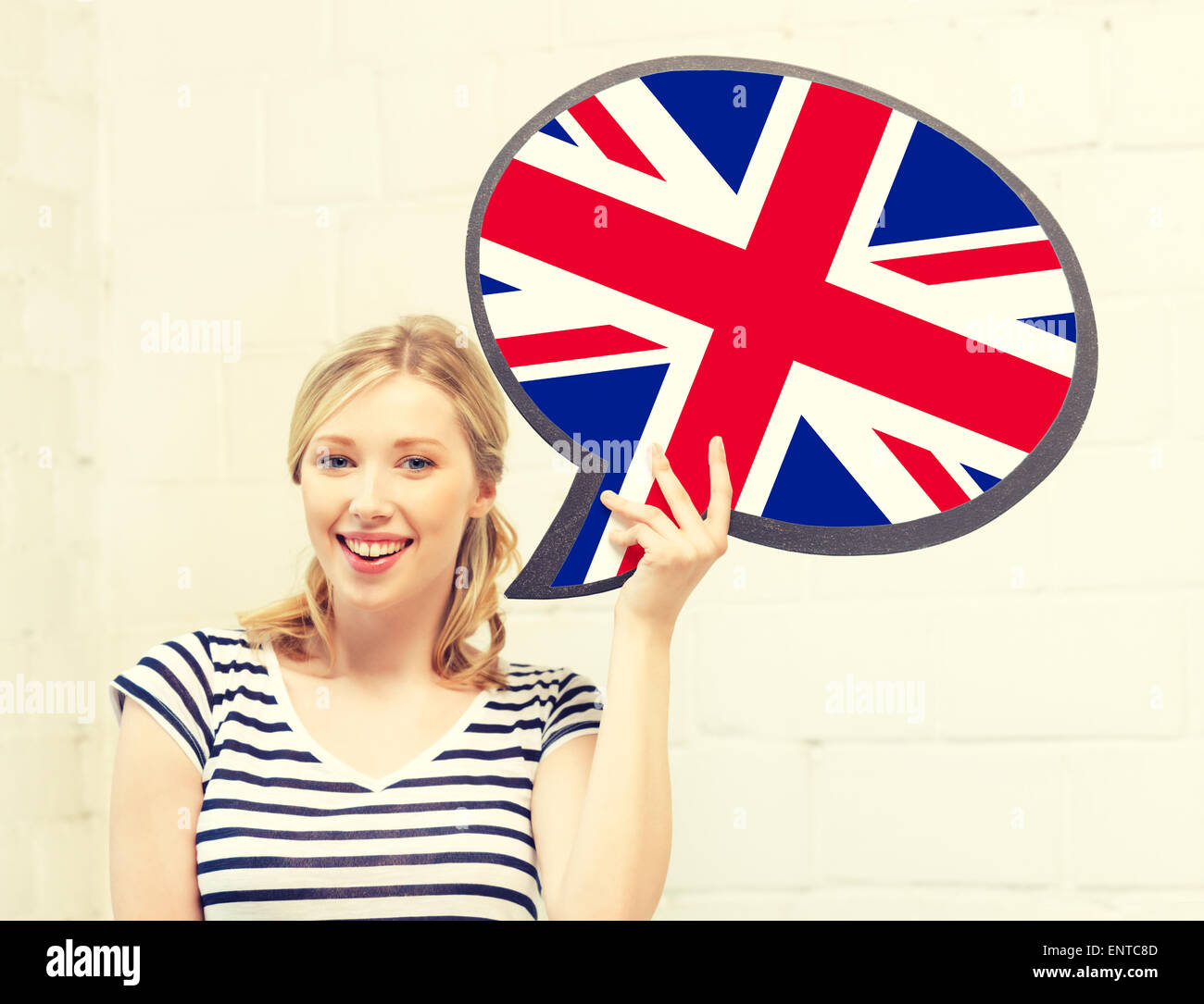 smiling woman with text bubble of british flag Stock Photo - Alamy