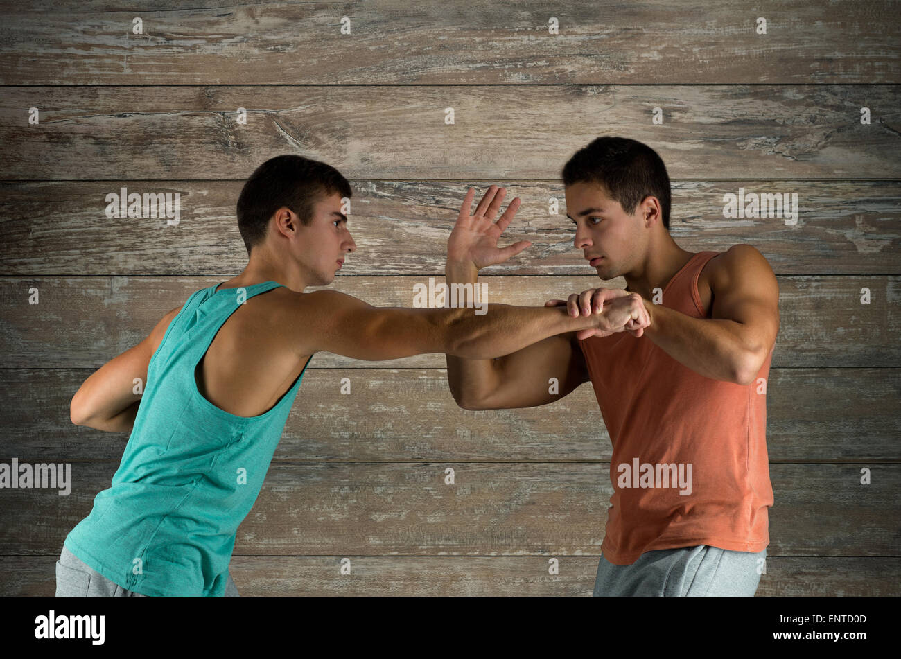 young men fighting hand-to-hand Stock Photo - Alamy