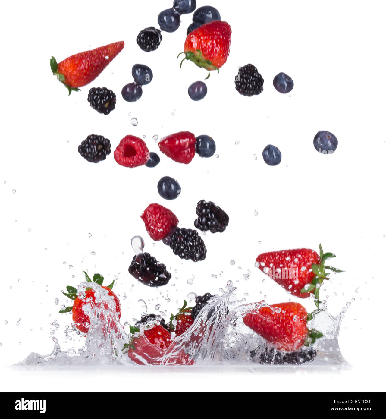 Fresh berries with water splash over white background Stock Photo - Alamy