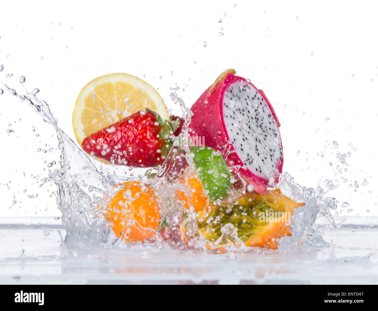 Fresh fruit with water splash Stock Photo - Alamy