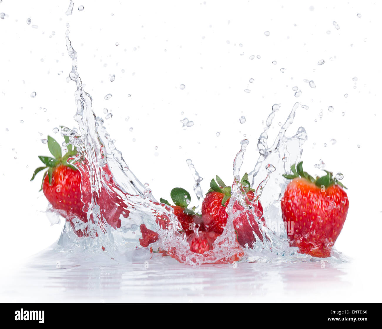 Fresh Strawberries with water splash over white background Stock Photo ...