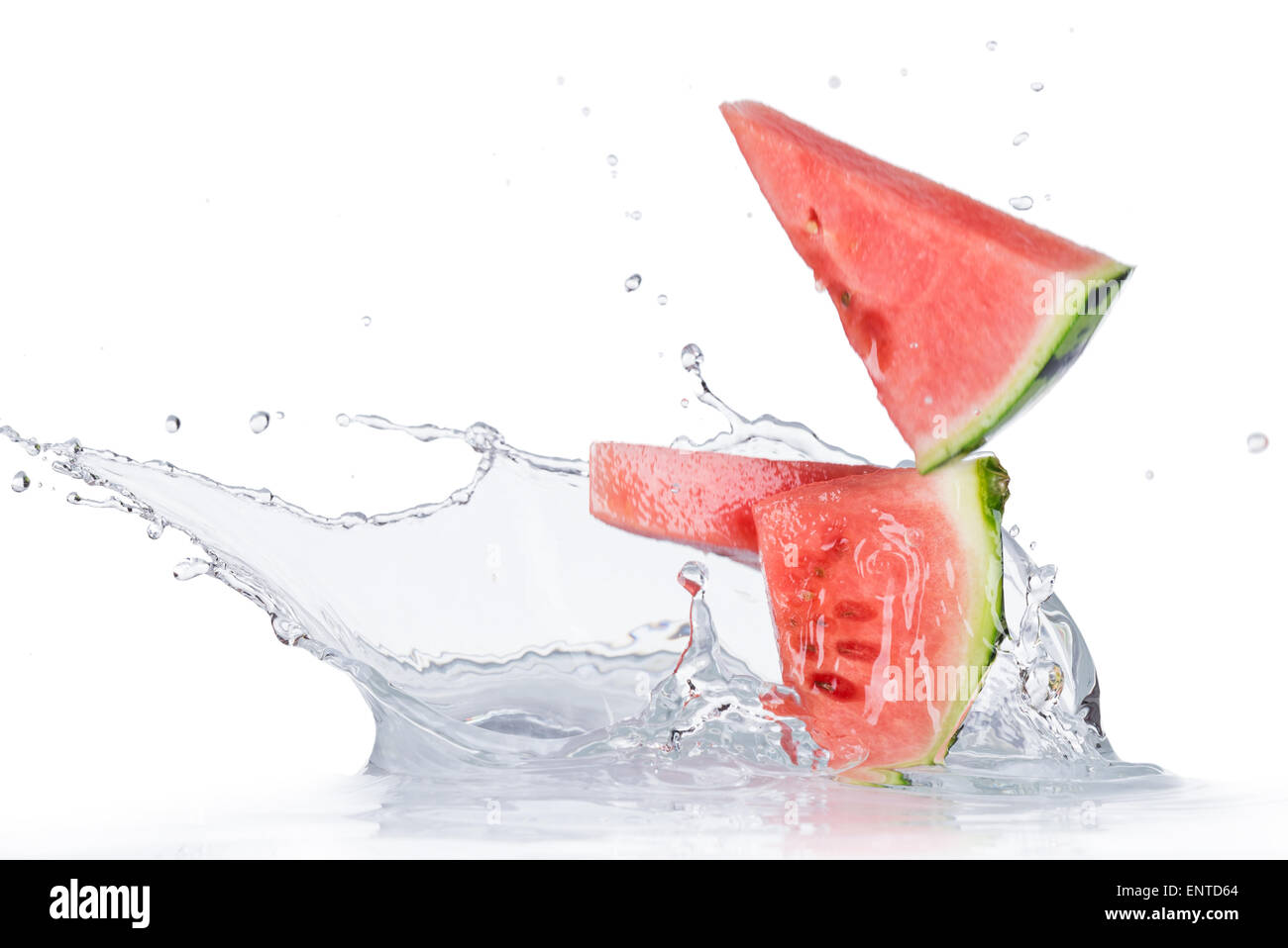 Fresh water melon with liquid splash over white background Stock Photo ...