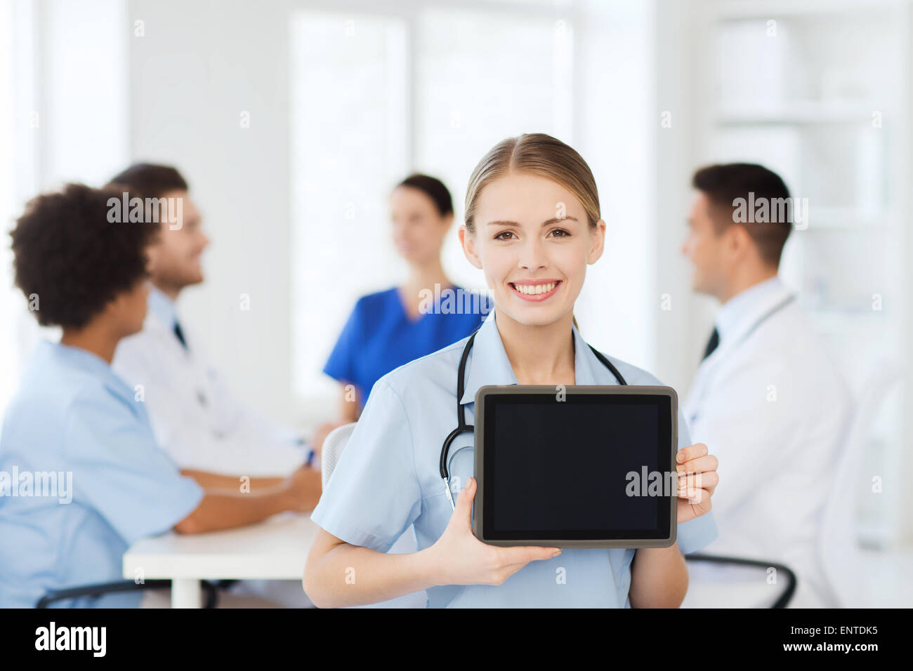 happy doctor over group of medics at hospital Stock Photo - Alamy