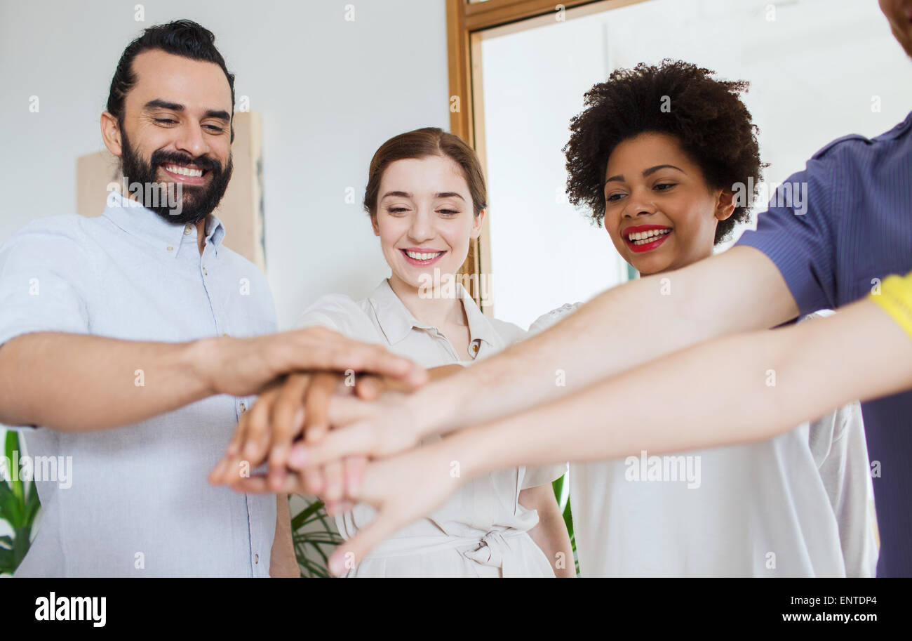 happy creative team in office Stock Photo - Alamy