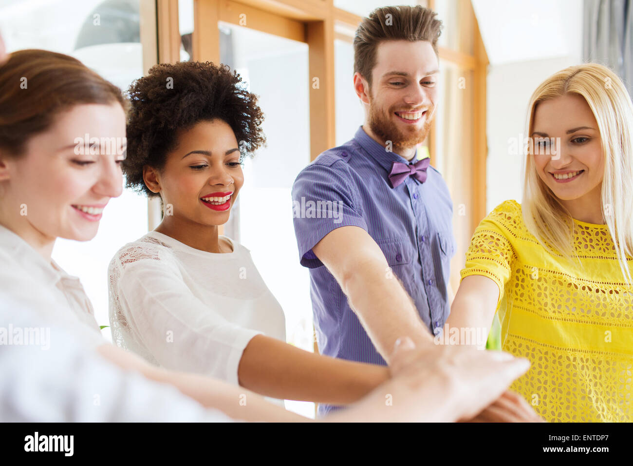 happy creative team in office Stock Photo - Alamy