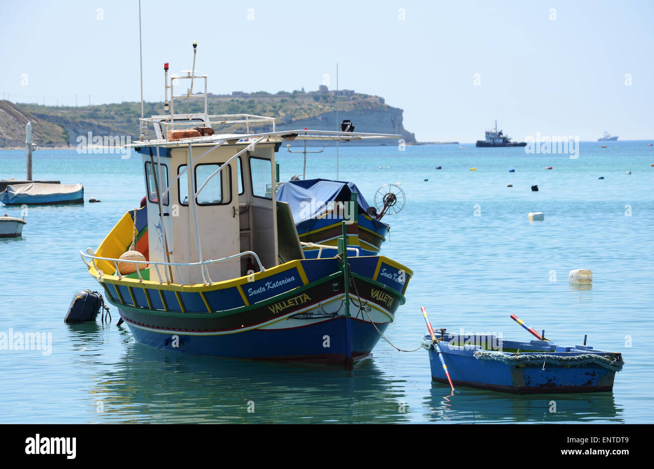 Traditional Maltese luzzu in Marsaxlokk harbour Stock Photo - Alamy