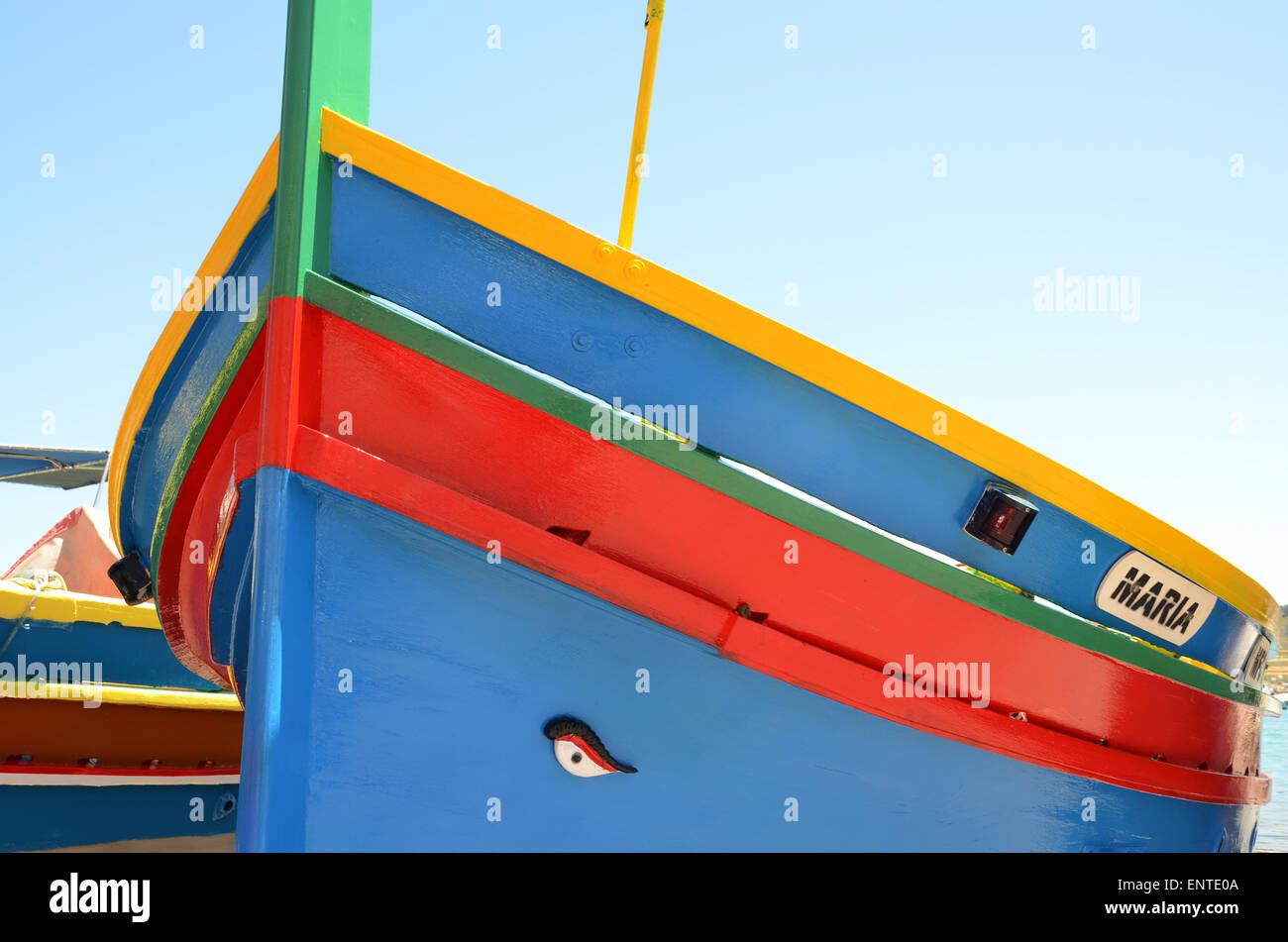 Traditional Maltese luzzu in Marsaxlokk harbour Stock Photo - Alamy