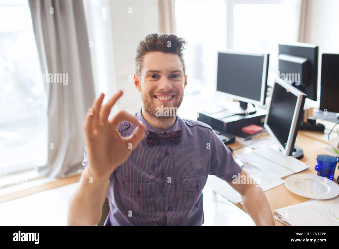 happy creative male office worker showing ok sign Stock Photo - Alamy