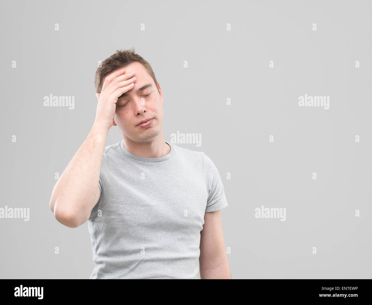 front view of man having a headache. copy space available Stock Photo ...