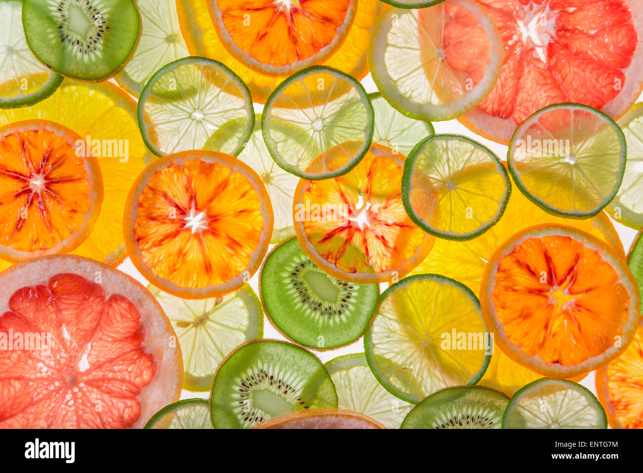 Sliced fruits background, close-up Stock Photo - Alamy