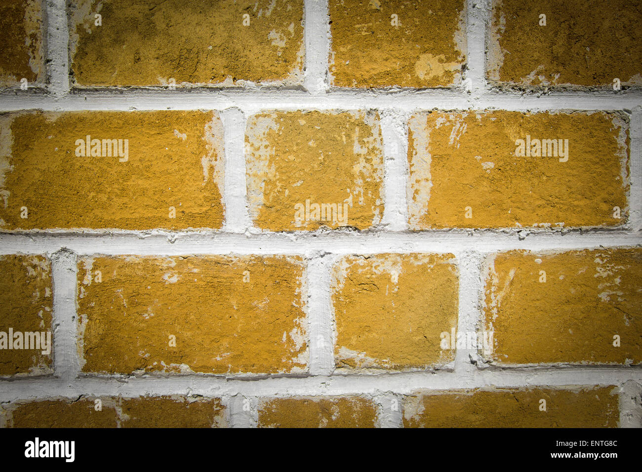 Yellow brick wall background, closeup Stock Photo - Alamy