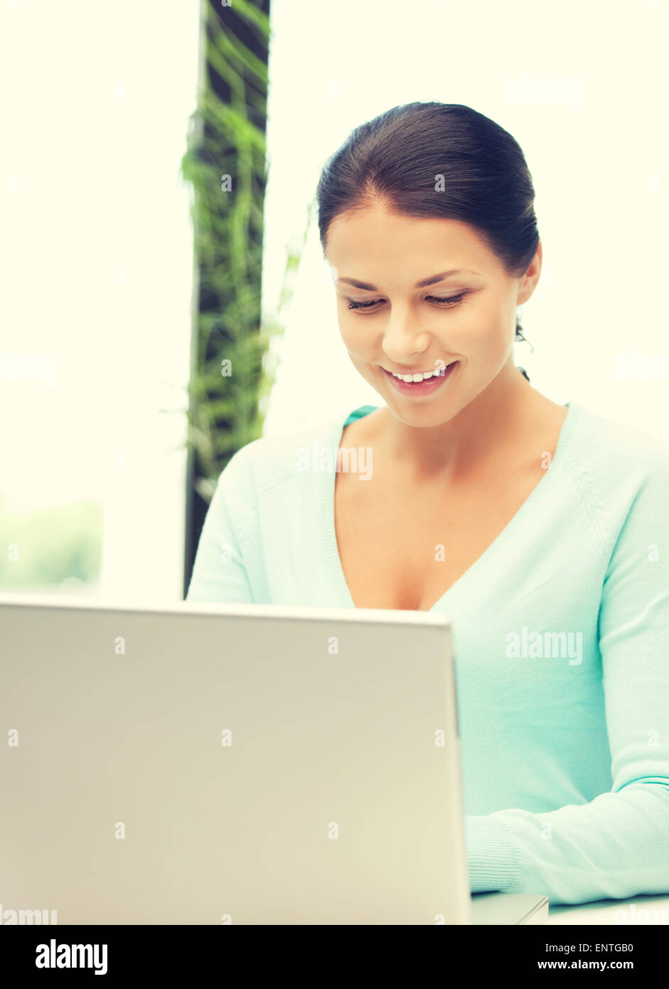 happy woman with laptop computer Stock Photo - Alamy