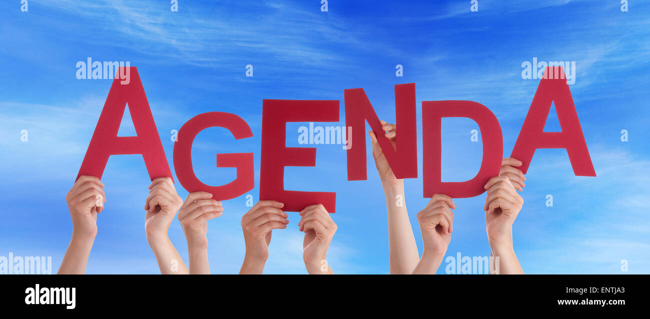 Many People Hands Holding Red Word Agenda Blue Sky Stock Photo - Alamy