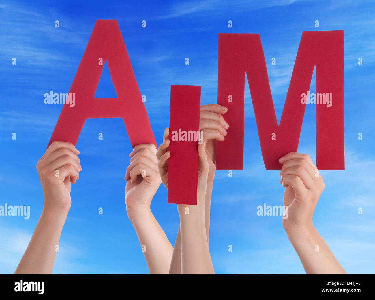 Many People Hands Holding Red Word Aim Blue Sky Stock Photo - Alamy