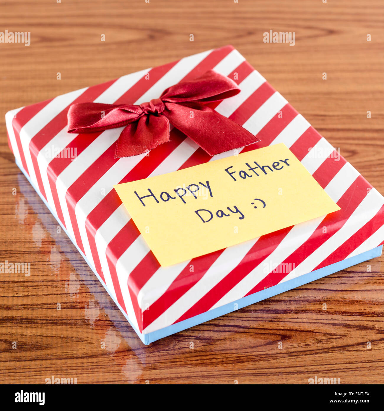 gift box with card write happy father day on wood background Stock ...