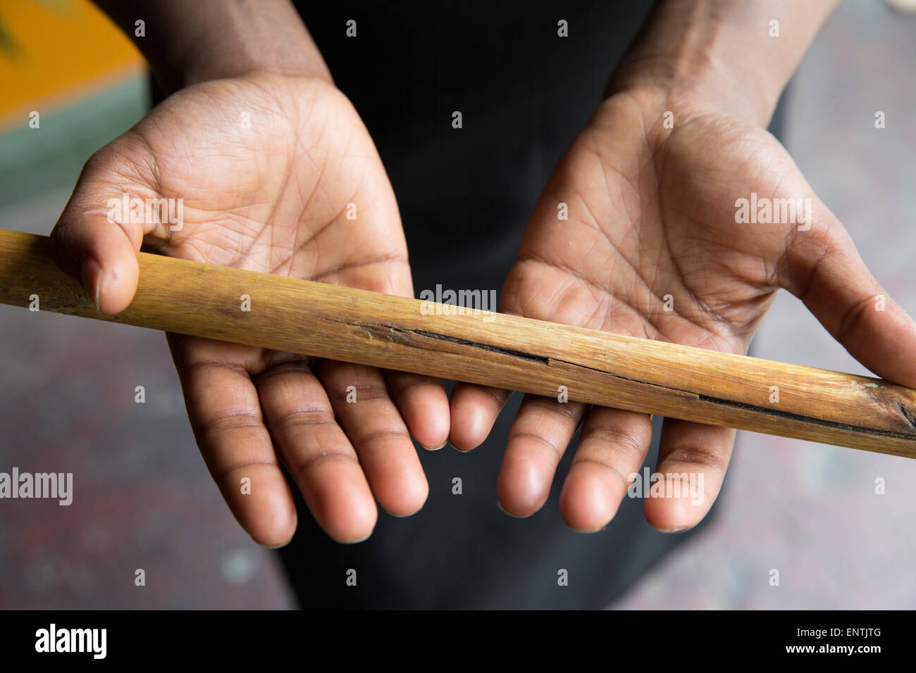 Hands holding a stirring stick Stock Photo - Alamy