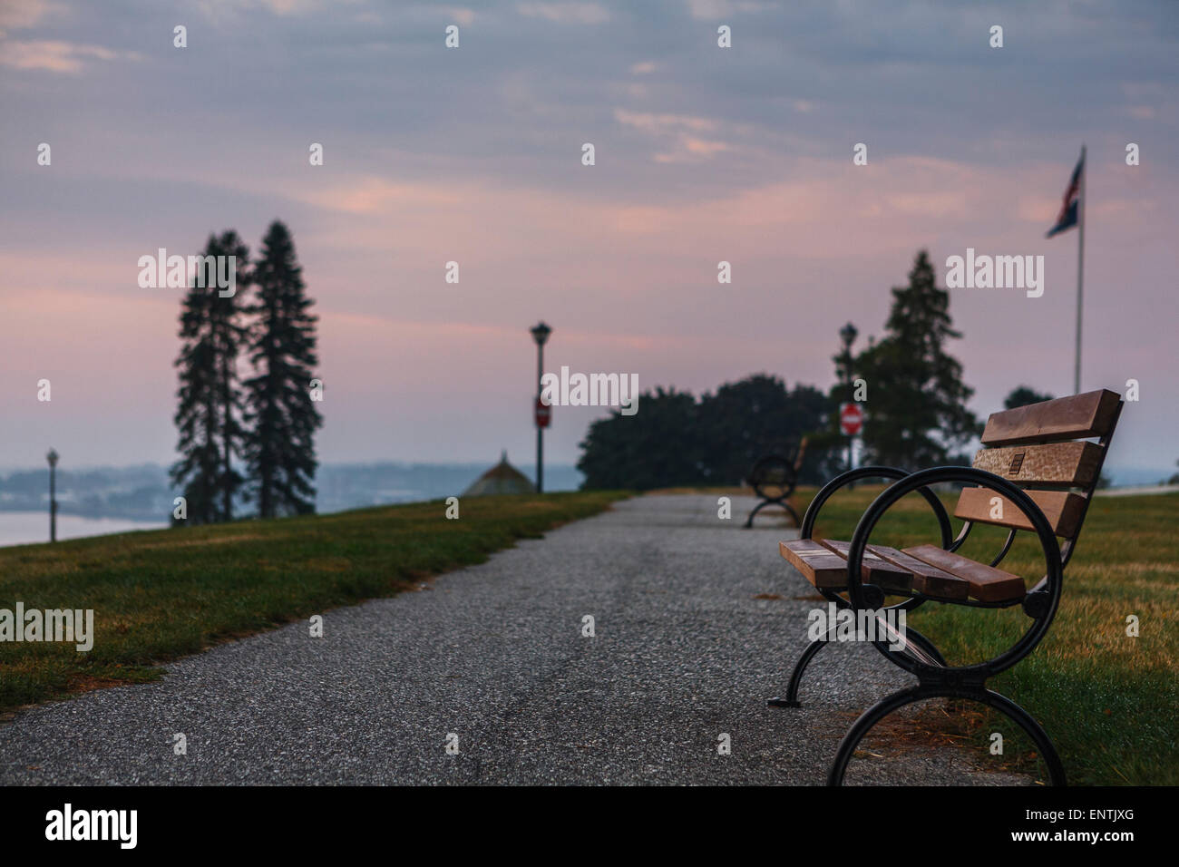 Park bench at sunrise Stock Photo - Alamy