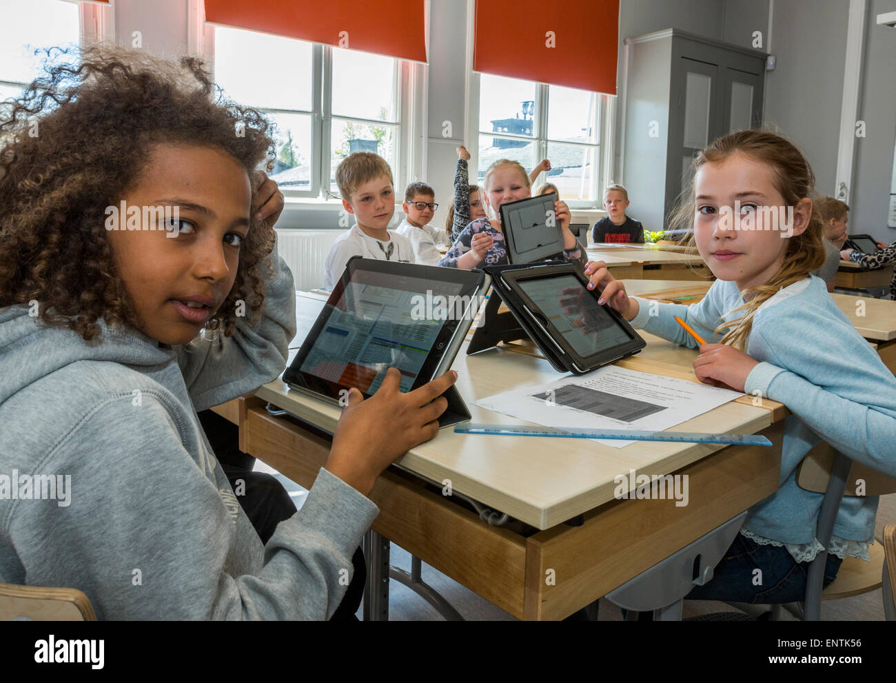 Students learn to use electronic means for teaching Stock Photo - Alamy