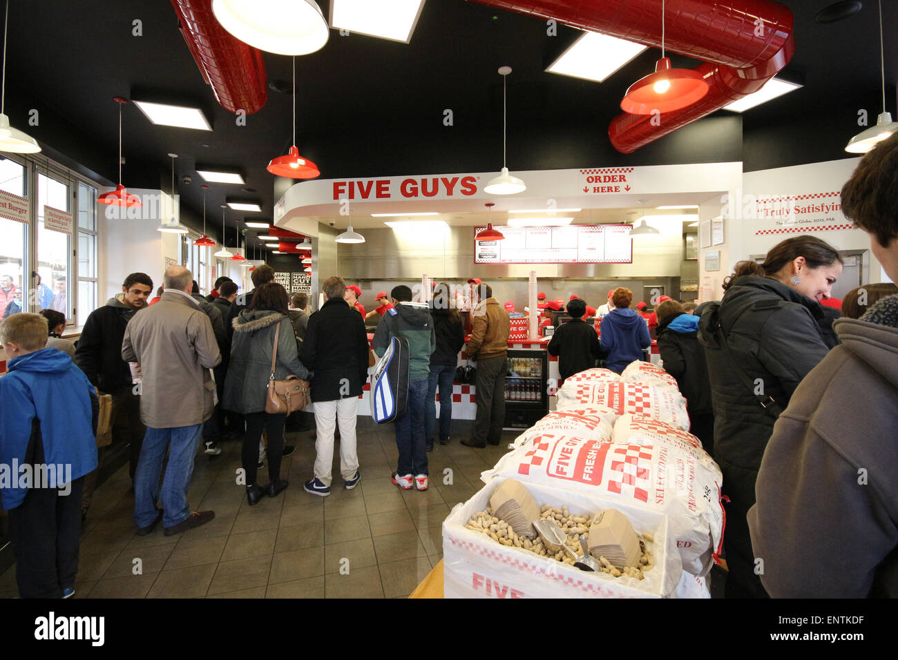 Customers of Five Guys waiting in a queue to be served food Stock Photo ...
