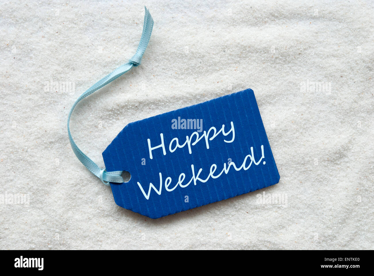 Happy Weekend On Blue Label Sand Background Stock Photo - Alamy