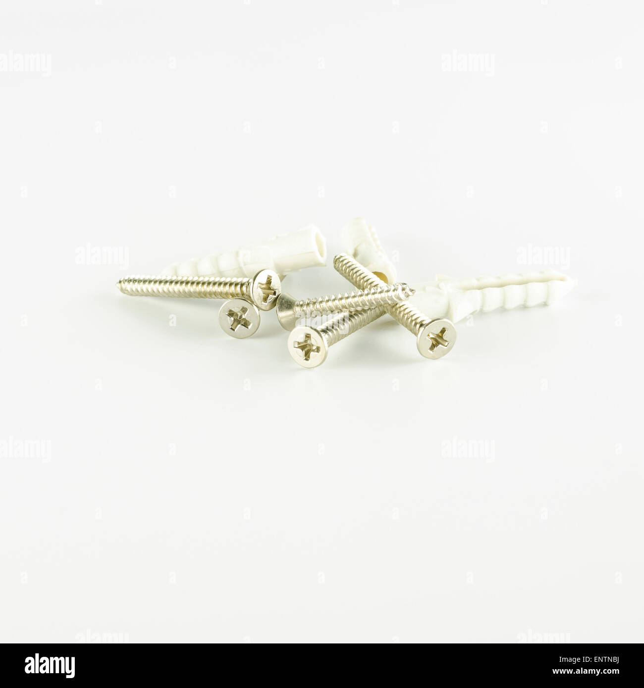 groups of screws on a white background Stock Photo - Alamy
