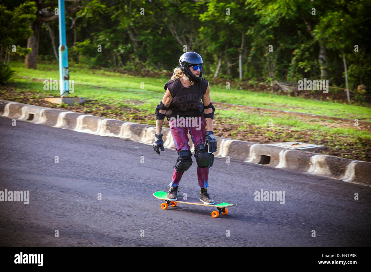 Man riding on a longboard skate, Bali, Indonesia Stock Photo - Alamy
