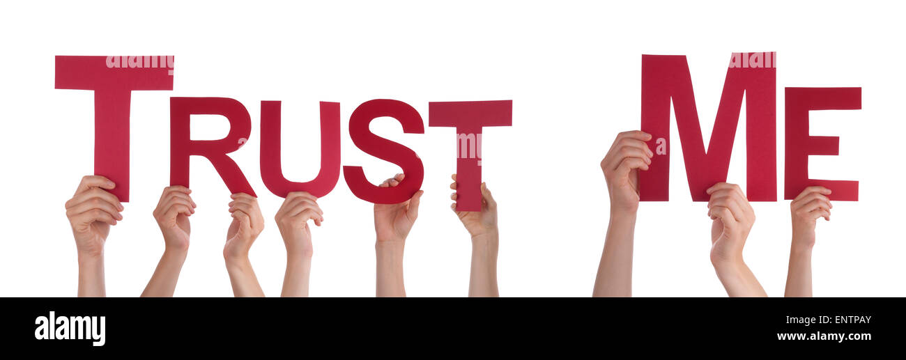 People Hands Holding Red Straight Word Trust Me Stock Photo - Alamy
