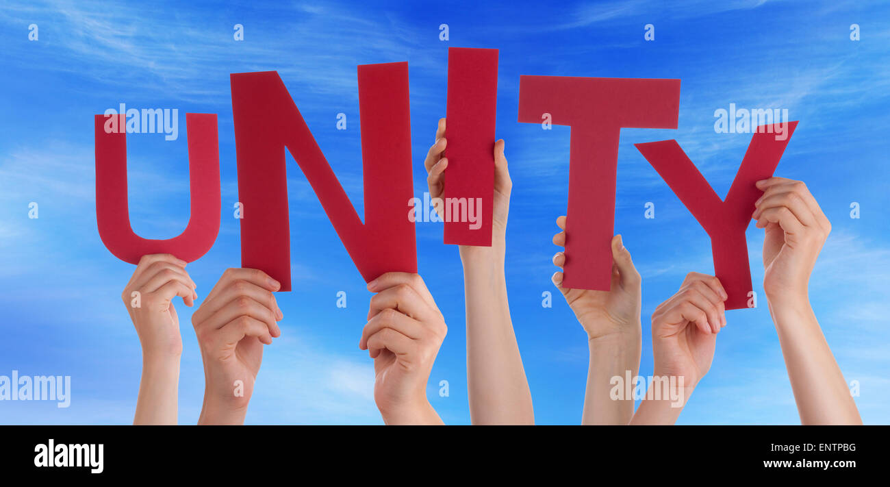 Many People Hands Holding Red Word Unity Blue Sky Stock Photo - Alamy