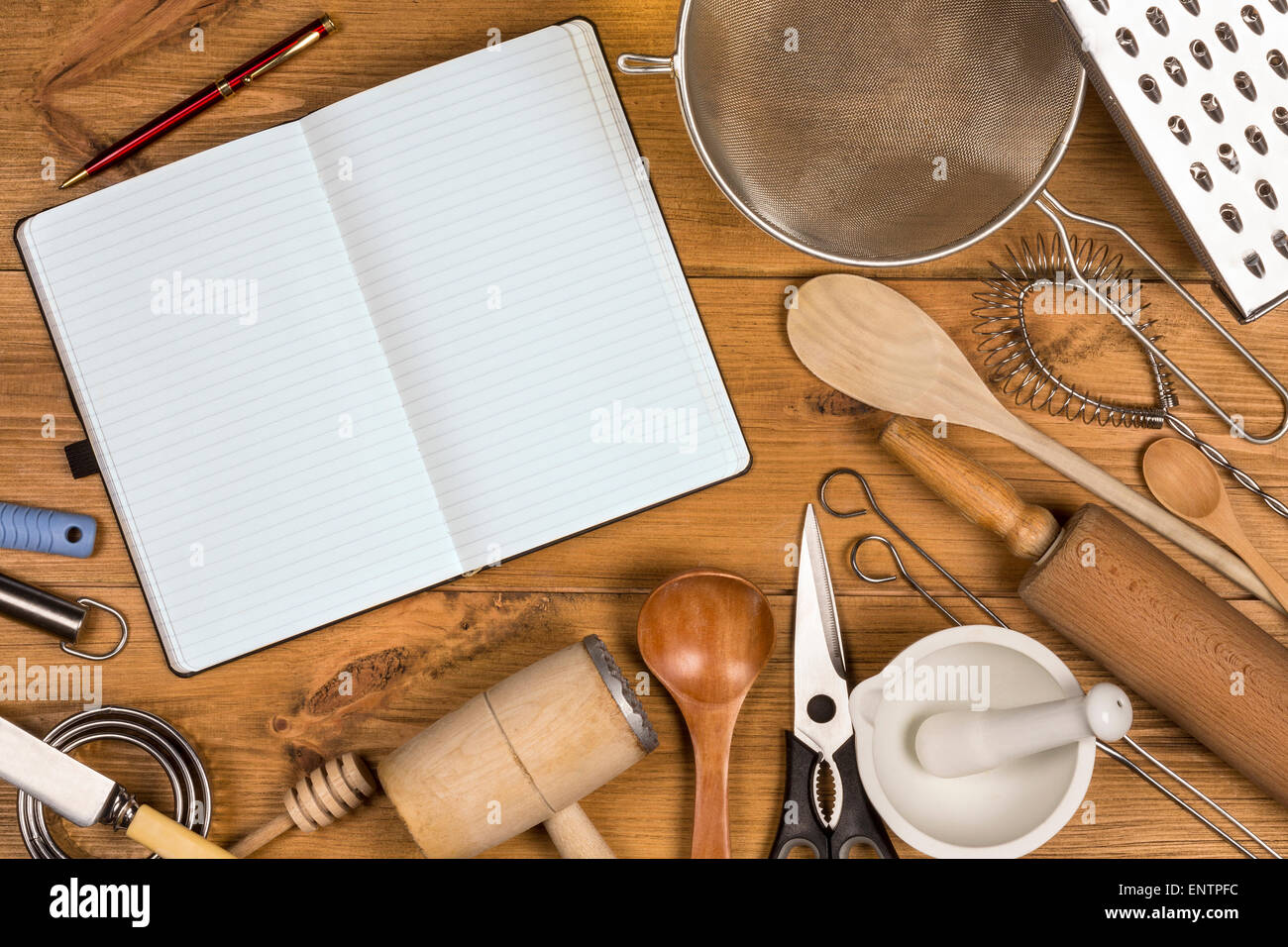 A selection of Kitchen Utensils on a farmhouse kitchen table - with ...