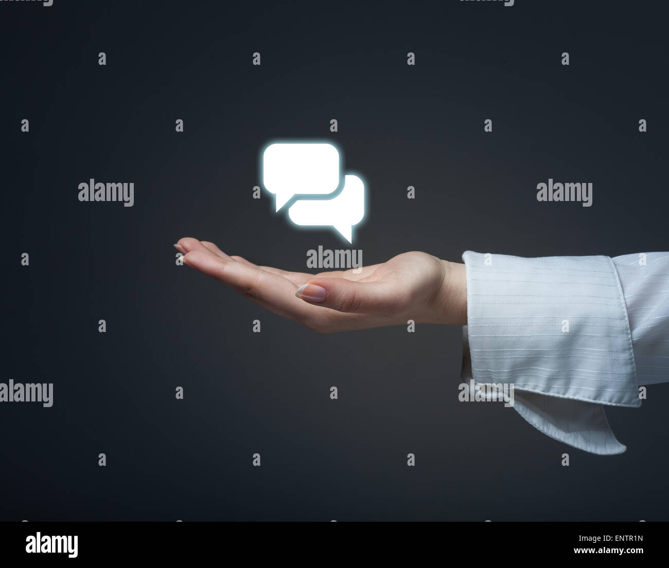 Female hand holding chat sign icon. Communication concept Stock Photo ...