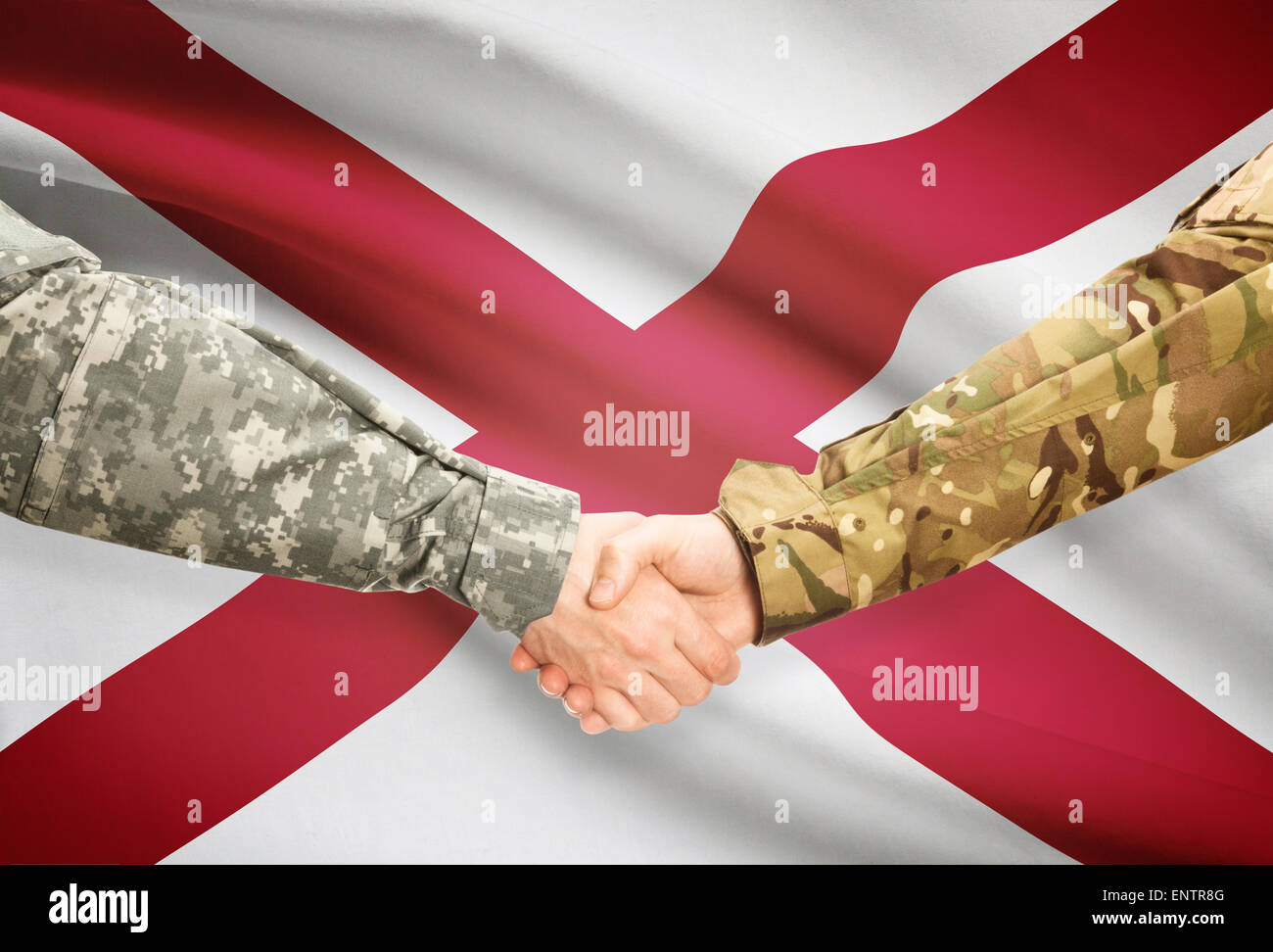 Soldiers handshake and US state flag - Alabama Stock Photo - Alamy