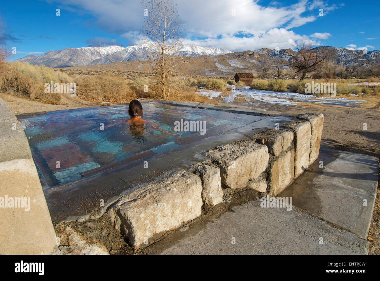 Woman in hot spring pool Stock Photo - Alamy