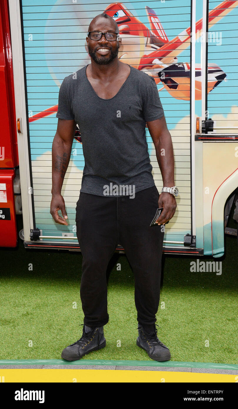 London UK. Martin Offiah and son at the Planes 2 'Fire and Rescue' gala ...